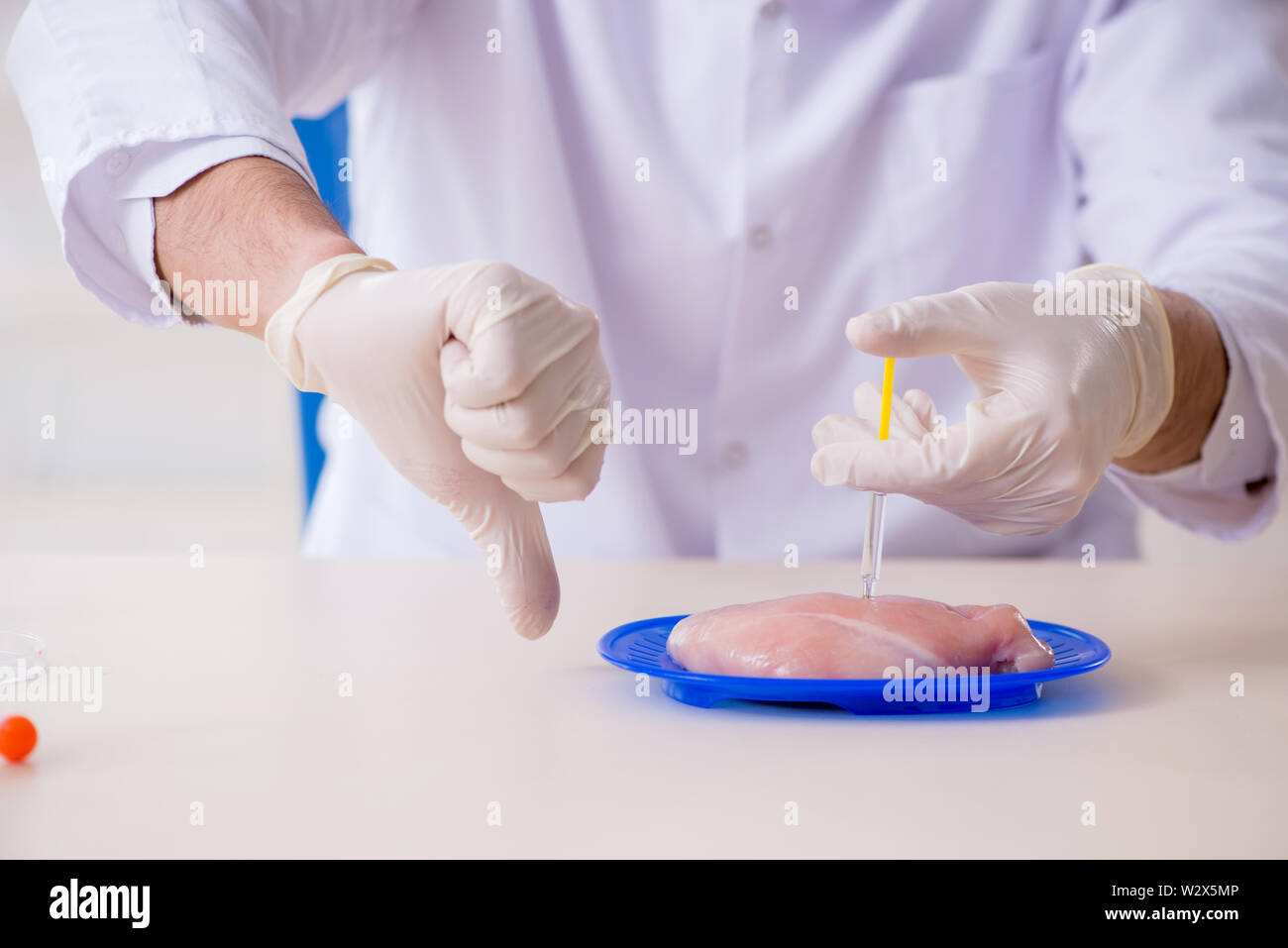 The male nutrition expert testing food products in lab Stock Photo - Alamy