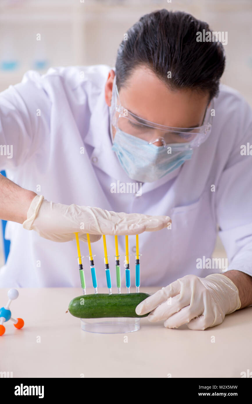 The male nutrition expert testing food products in lab Stock Photo - Alamy