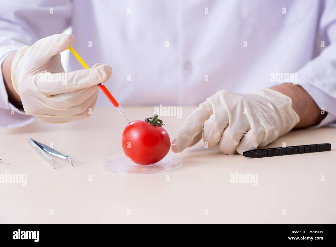 The male nutrition expert testing food products in lab Stock Photo - Alamy