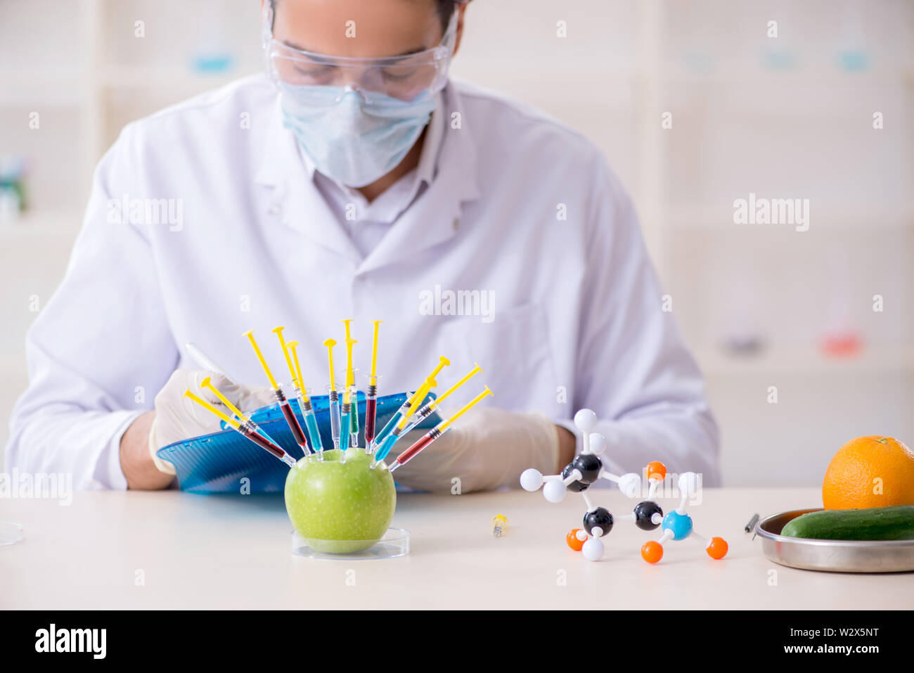 The male nutrition expert testing food products in lab Stock Photo - Alamy