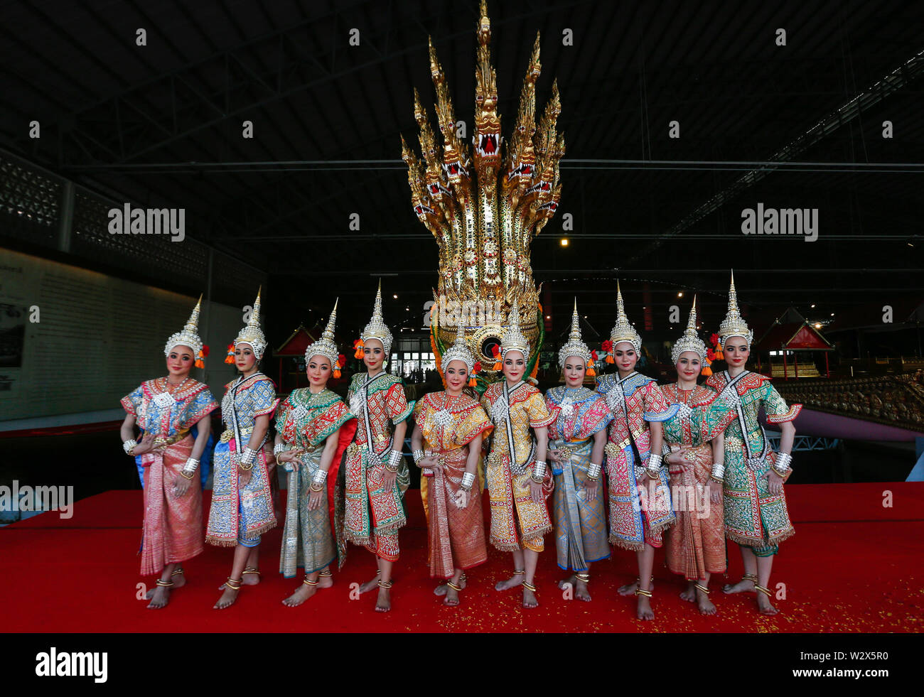 Bangkok, Thailand. 11th July, 2019. Traditional Thai performers poses ...