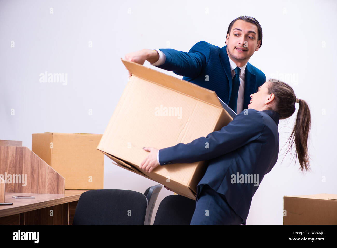 The two employees being fired from their work Stock Photo - Alamy