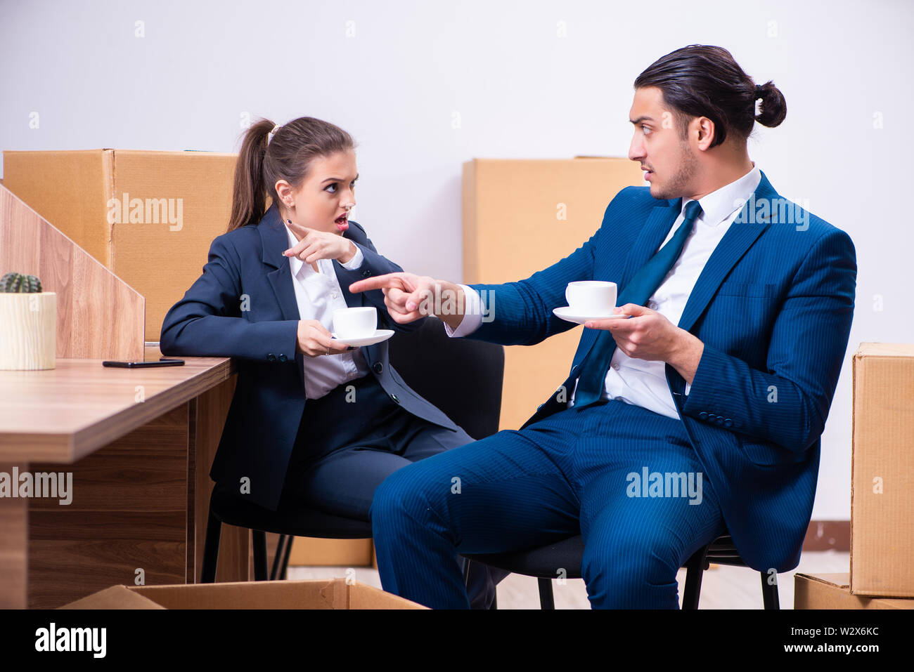 The two employees being fired from their work Stock Photo - Alamy