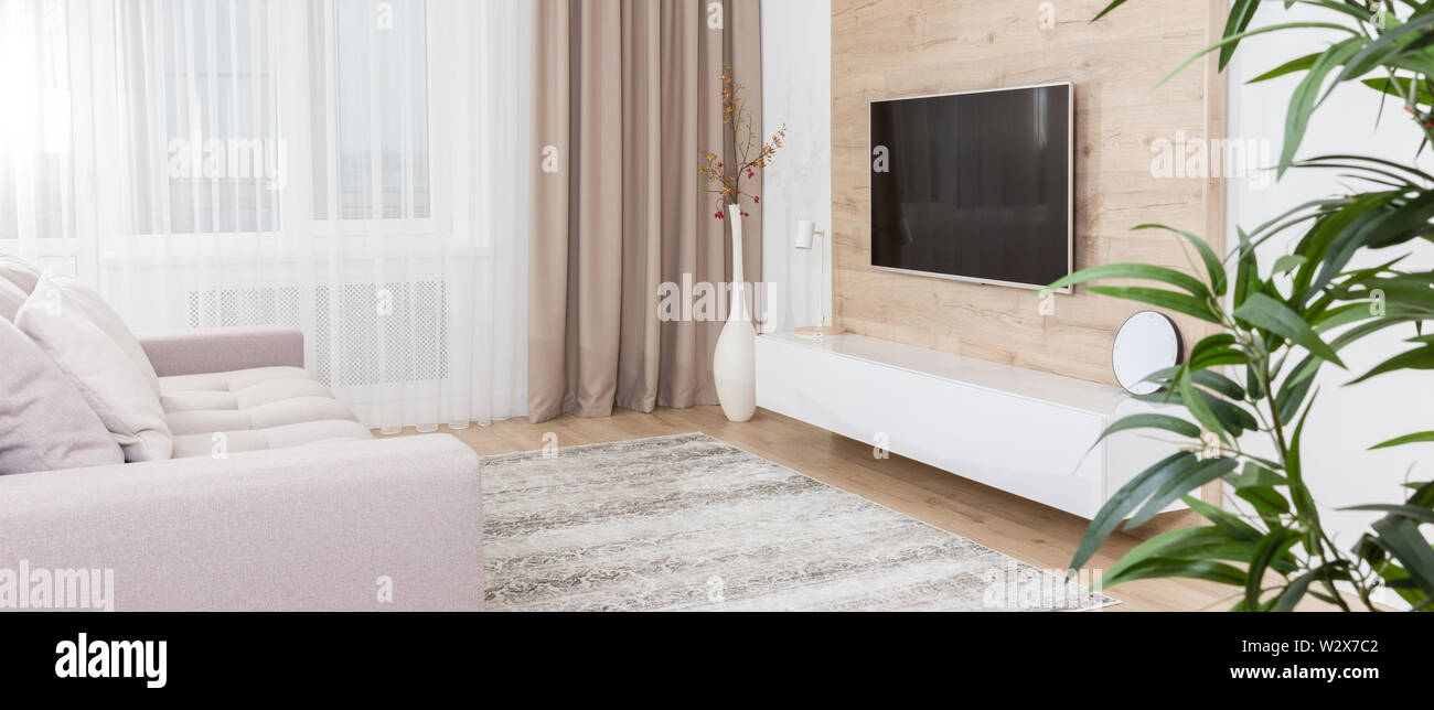 Panoramic picture of a spacious living room full of light Stock Photo ...