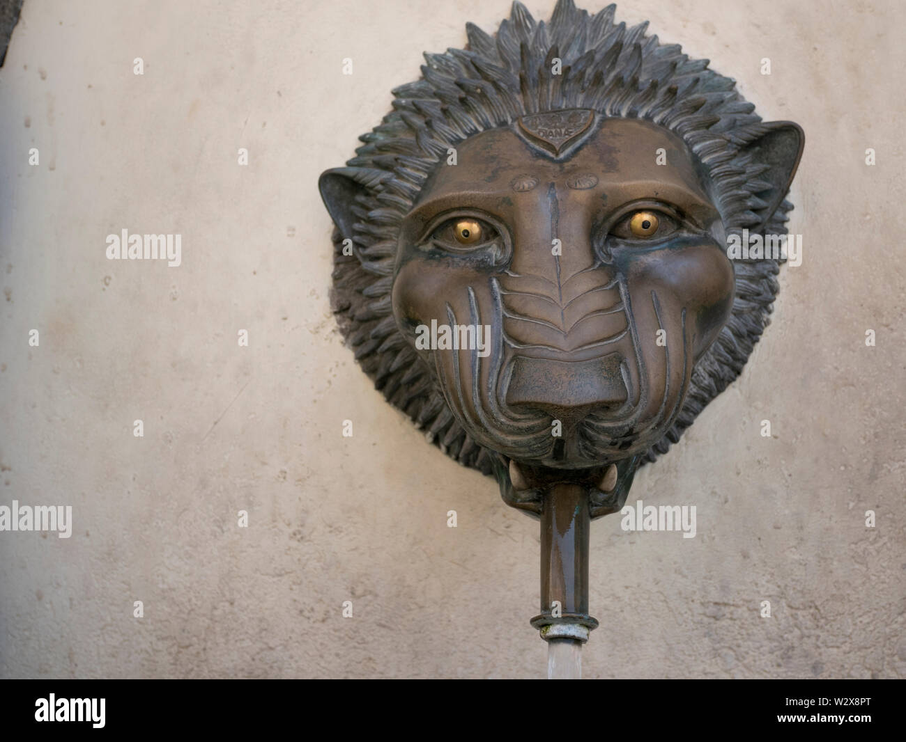 public fountain in Nemi, head of a wolf Stock Photo - Alamy