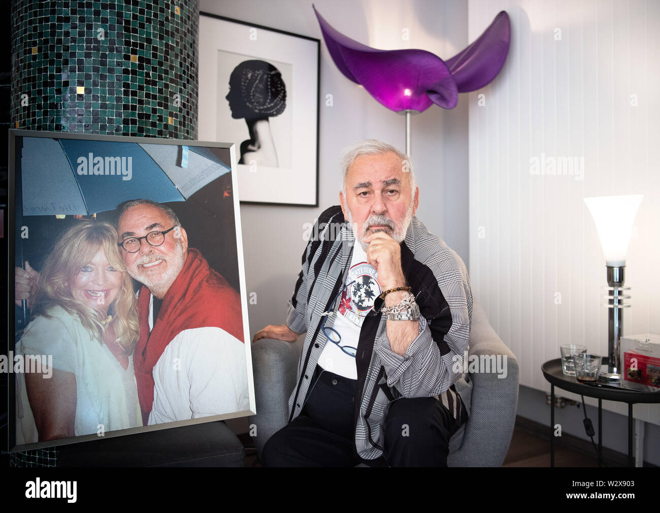 Berlin, Germany. 10th July, 2019. Udo Walz sits in his salon on ...