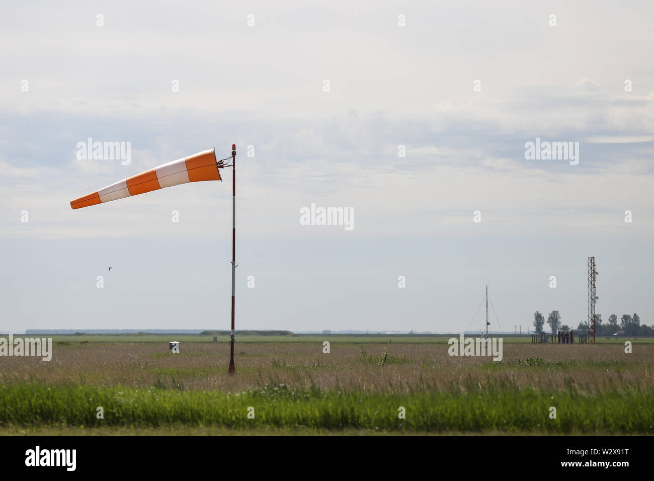 Details with a wind direction indicator on an airport Stock Photo - Alamy