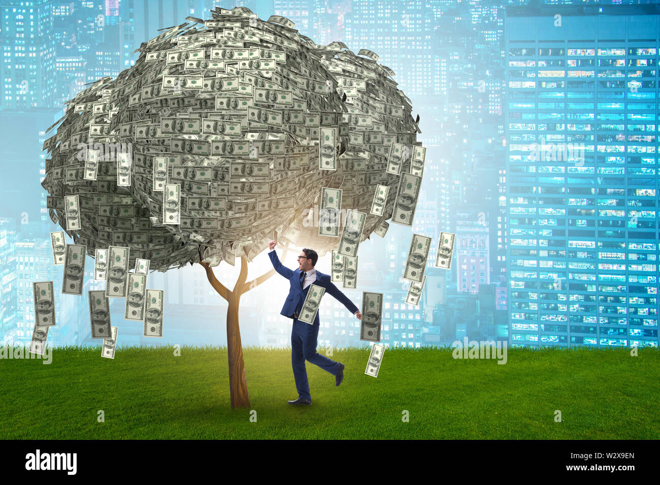 The businessman with money tree in business concept Stock Photo - Alamy