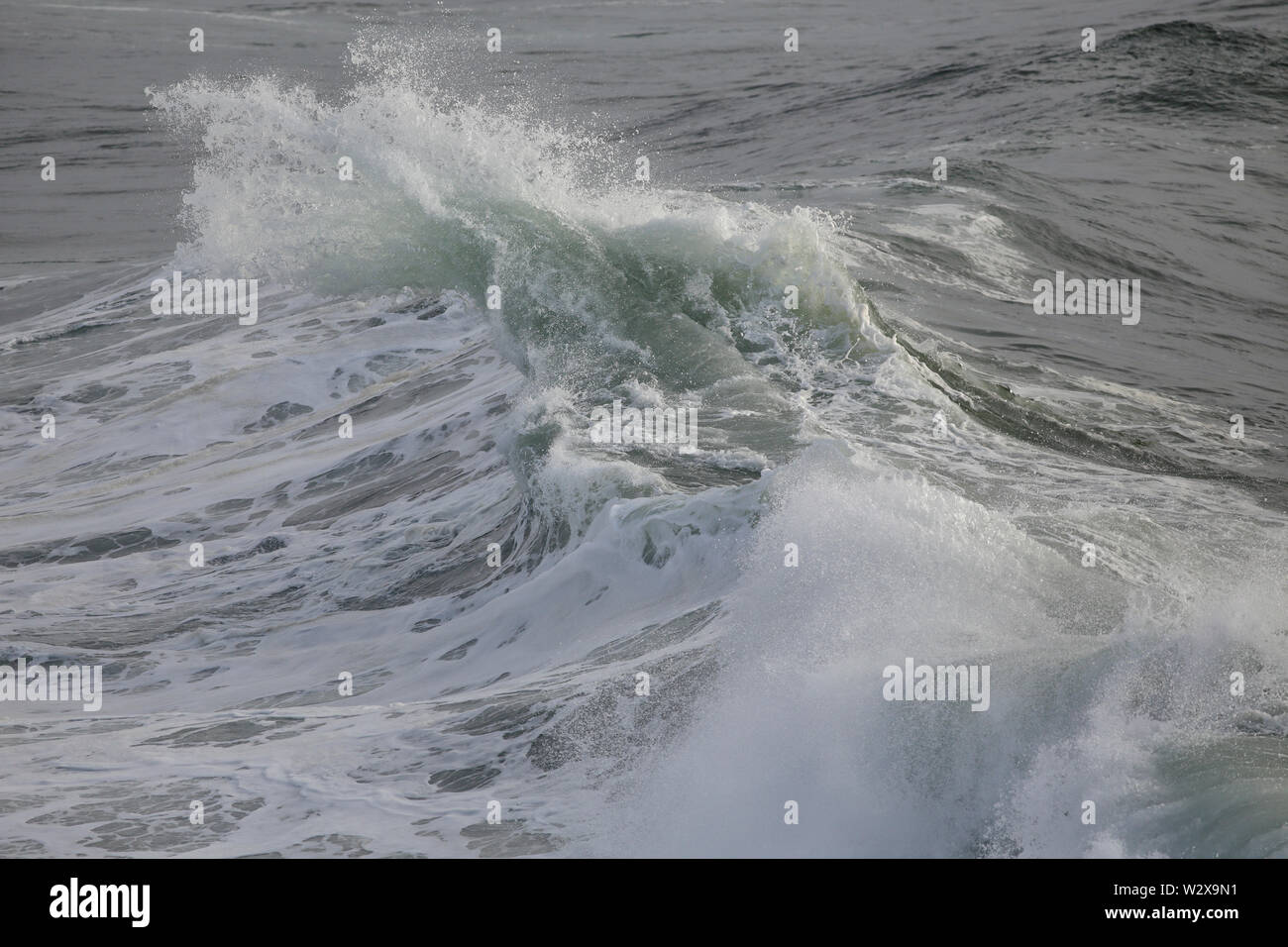Breaking wave closeup as seen from above Stock Photo - Alamy