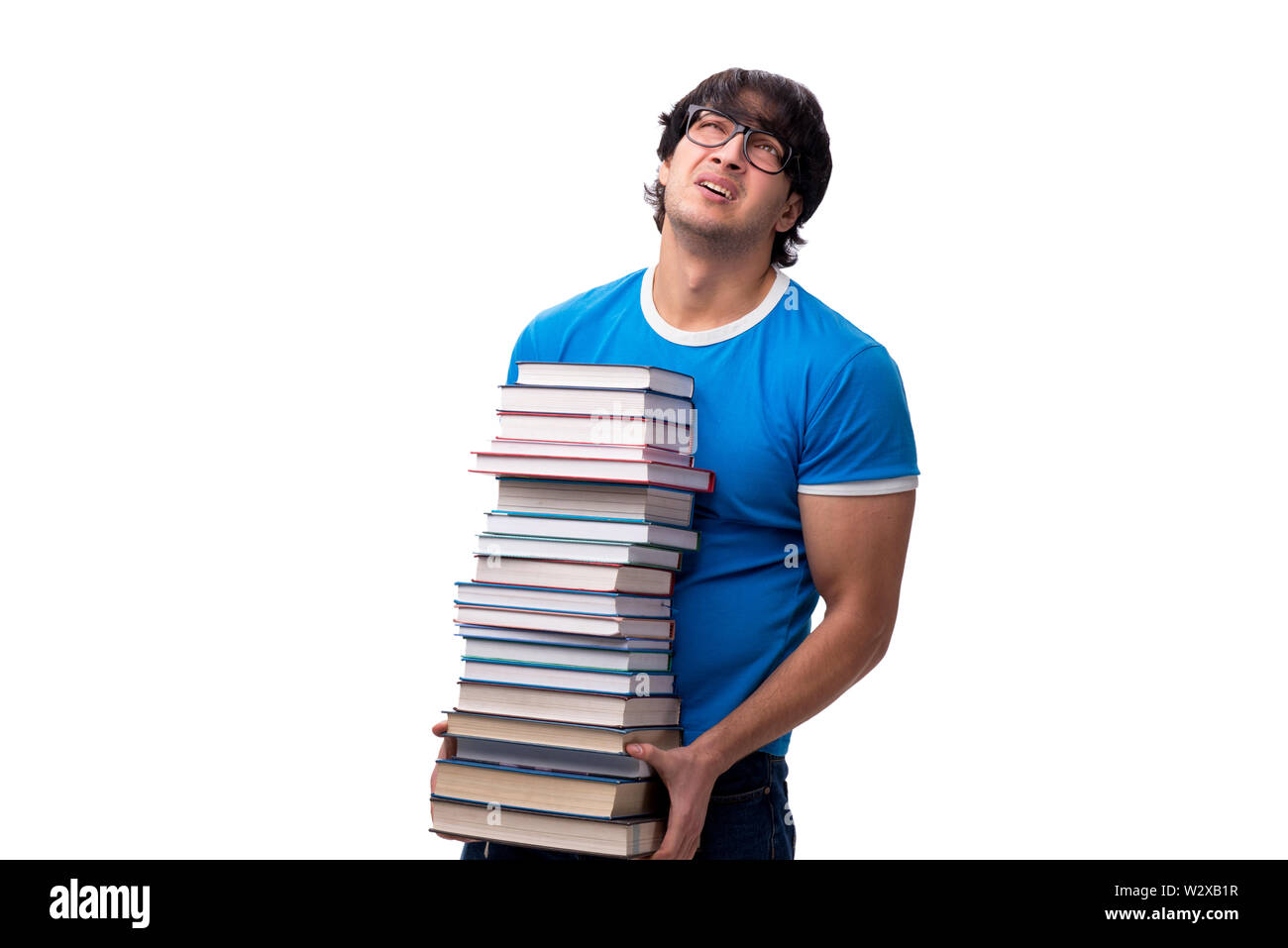 The male student with many books isolated on white Stock Photo - Alamy