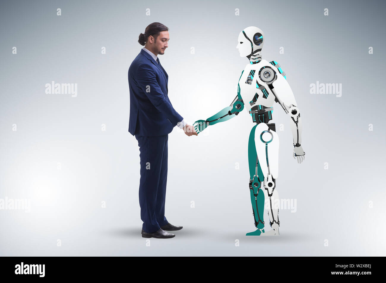 Digital handshake between man machine hi-res stock photography and ...