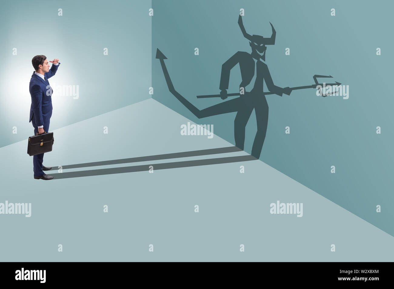 The devil hiding in the businessman - alter ego concept Stock Photo - Alamy