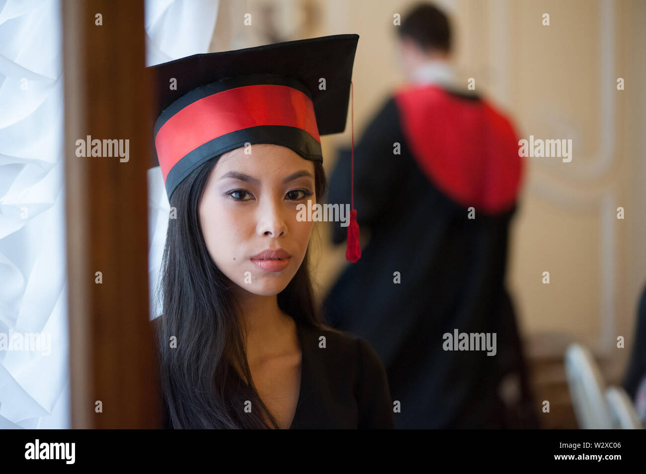 Teen girl in graduation gown hi-res stock photography and images - Alamy