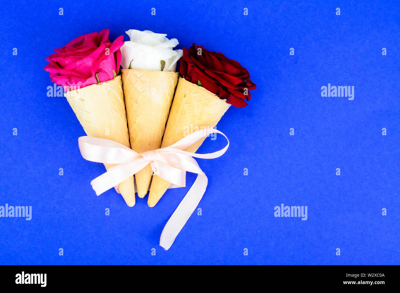 Roses in awafer ice cream cone Stock Photo - Alamy