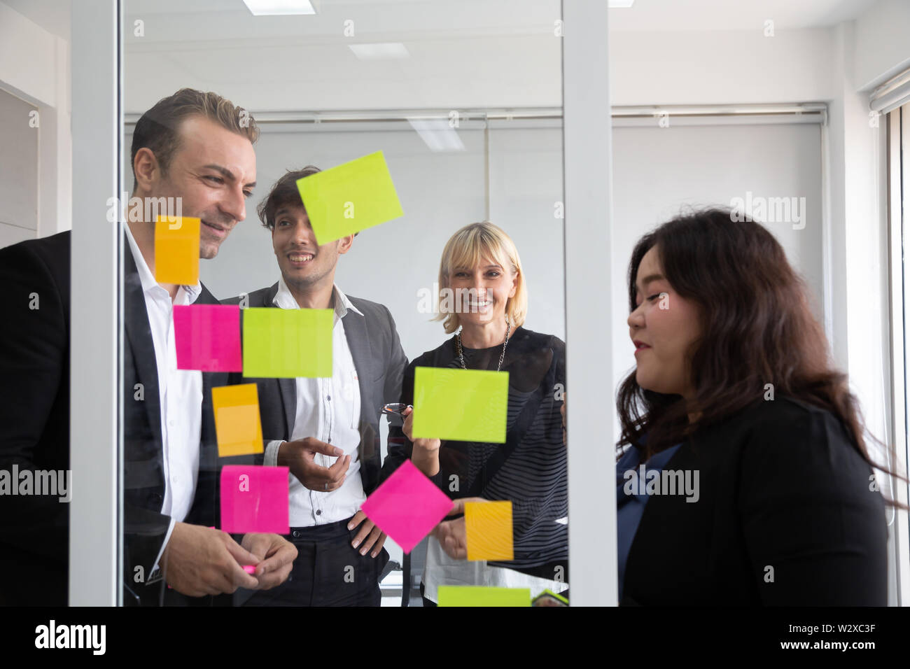 Business people meeting team, briefing and discussing new plan ...