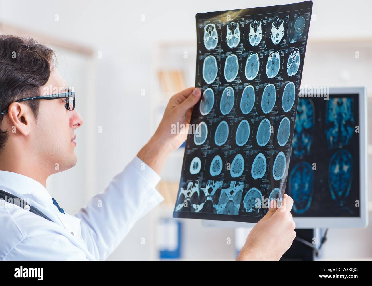 The doctor radiologist looking at x-ray images Stock Photo - Alamy