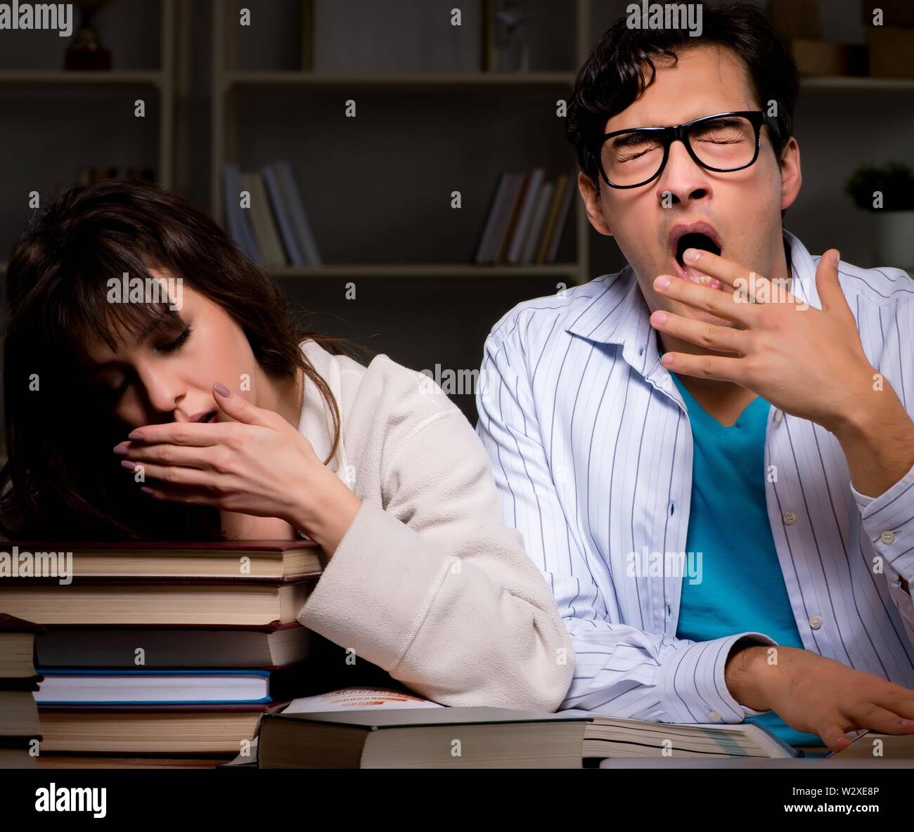 The two students studying late preparing for exams Stock Photo - Alamy