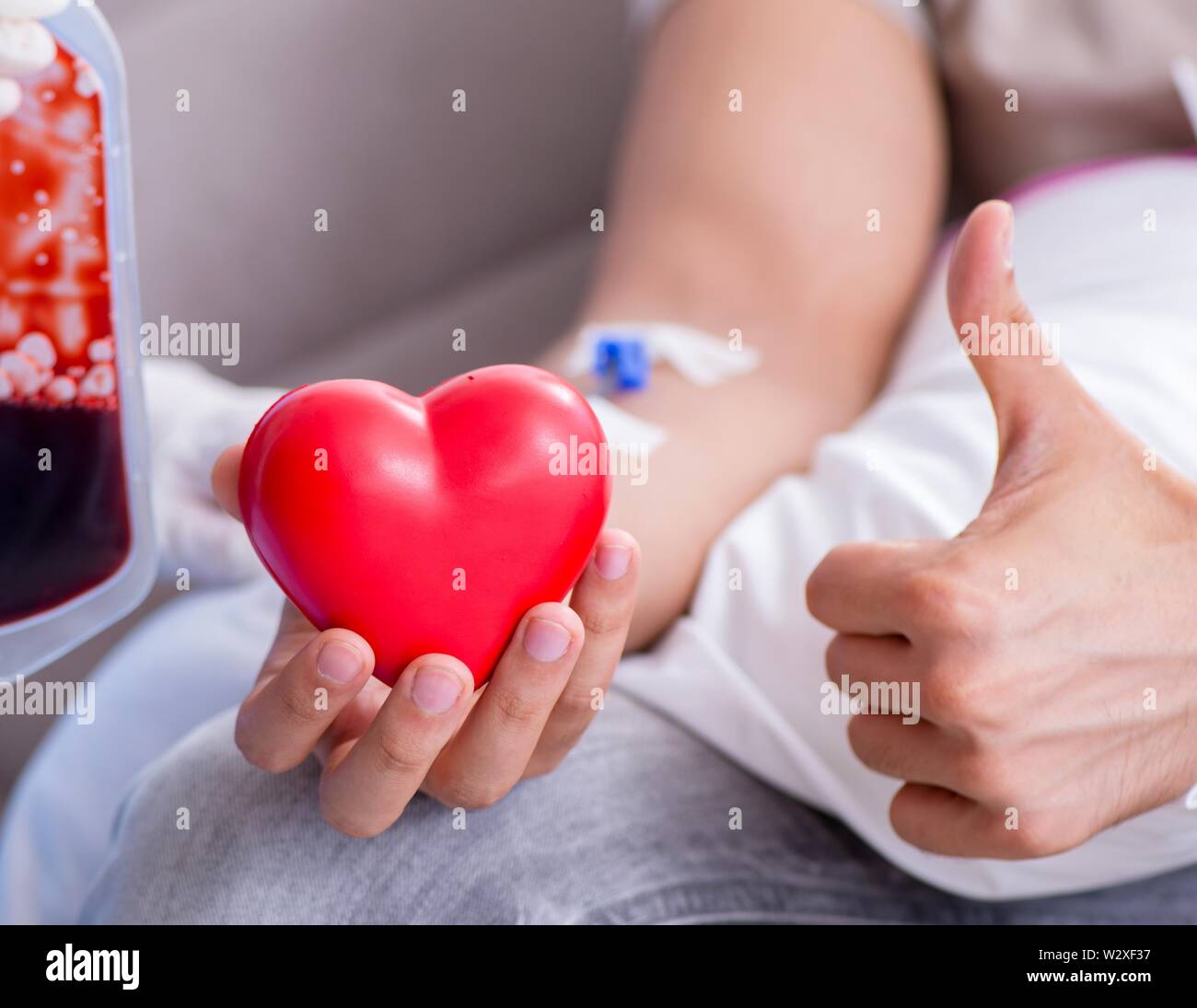 The patient getting blood transfusion in hospital clinic Stock Photo ...