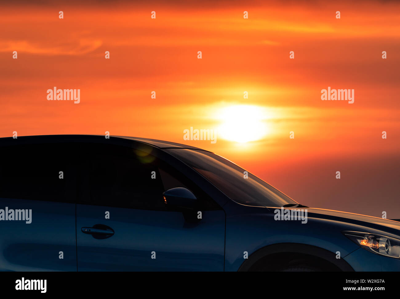 Side view of blue SUV car with sport and modern design parked on ...