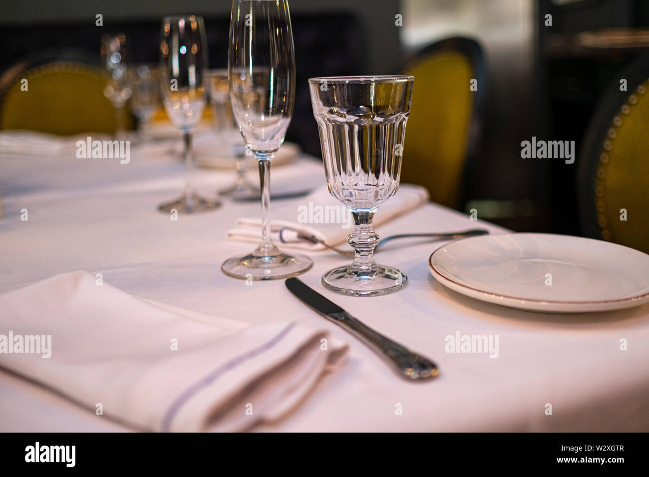 Natural light or daylight shot of modern restaurant table set for a ...