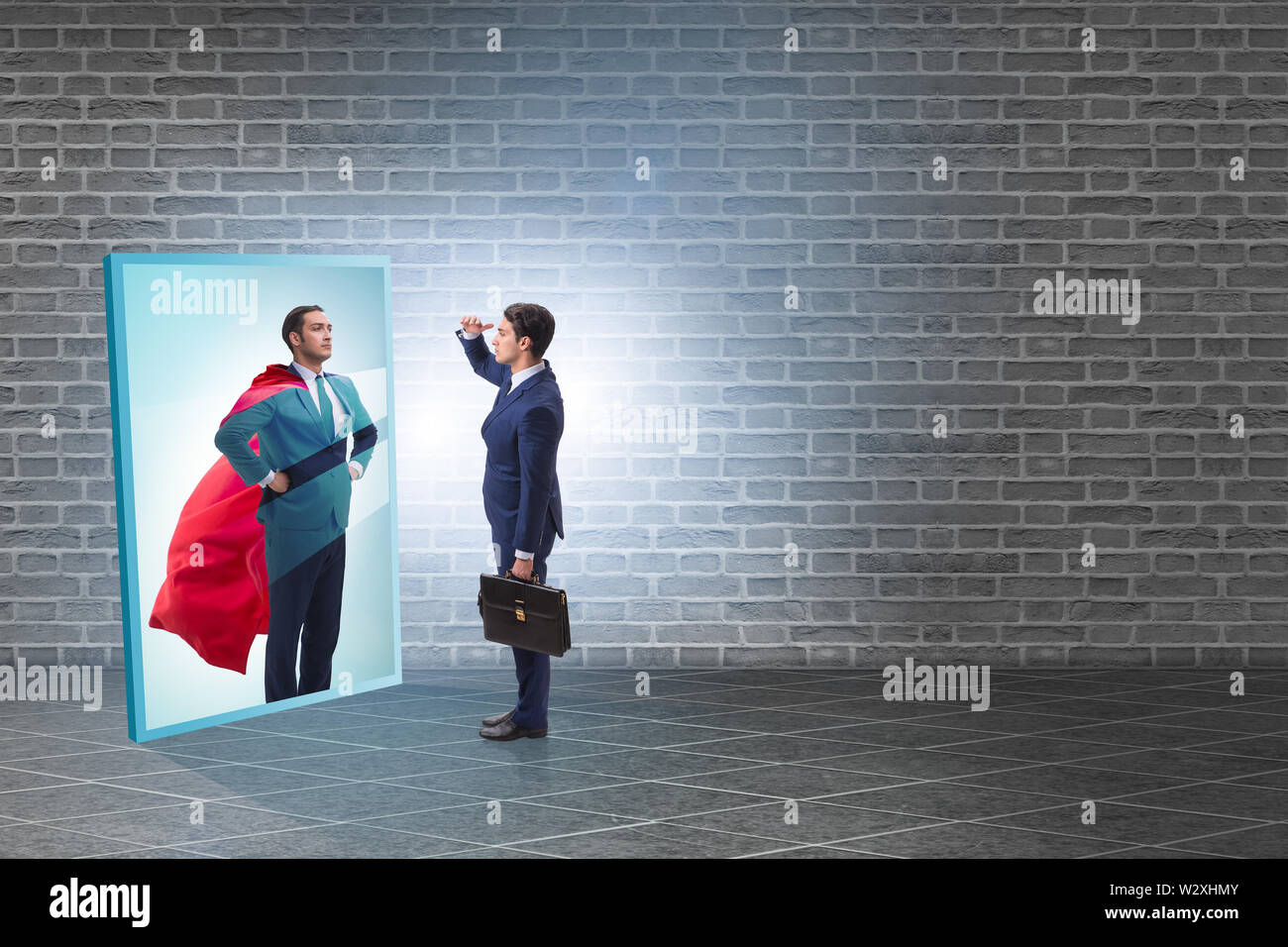 The businessman seeing himself in mirror as superhero Stock Photo - Alamy