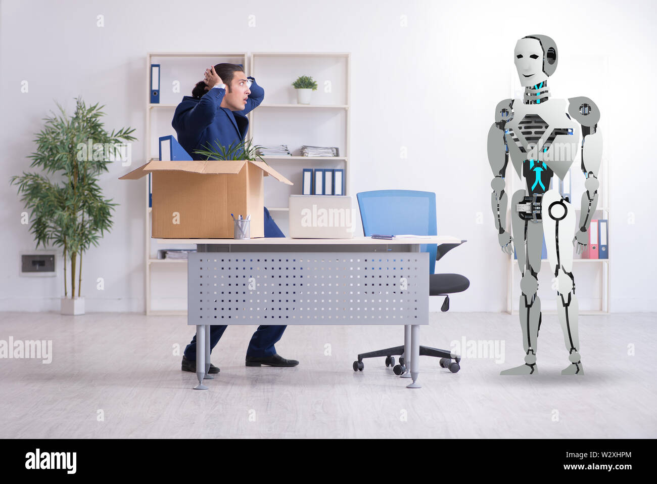 The concept of robots replacing humans in offices Stock Photo - Alamy