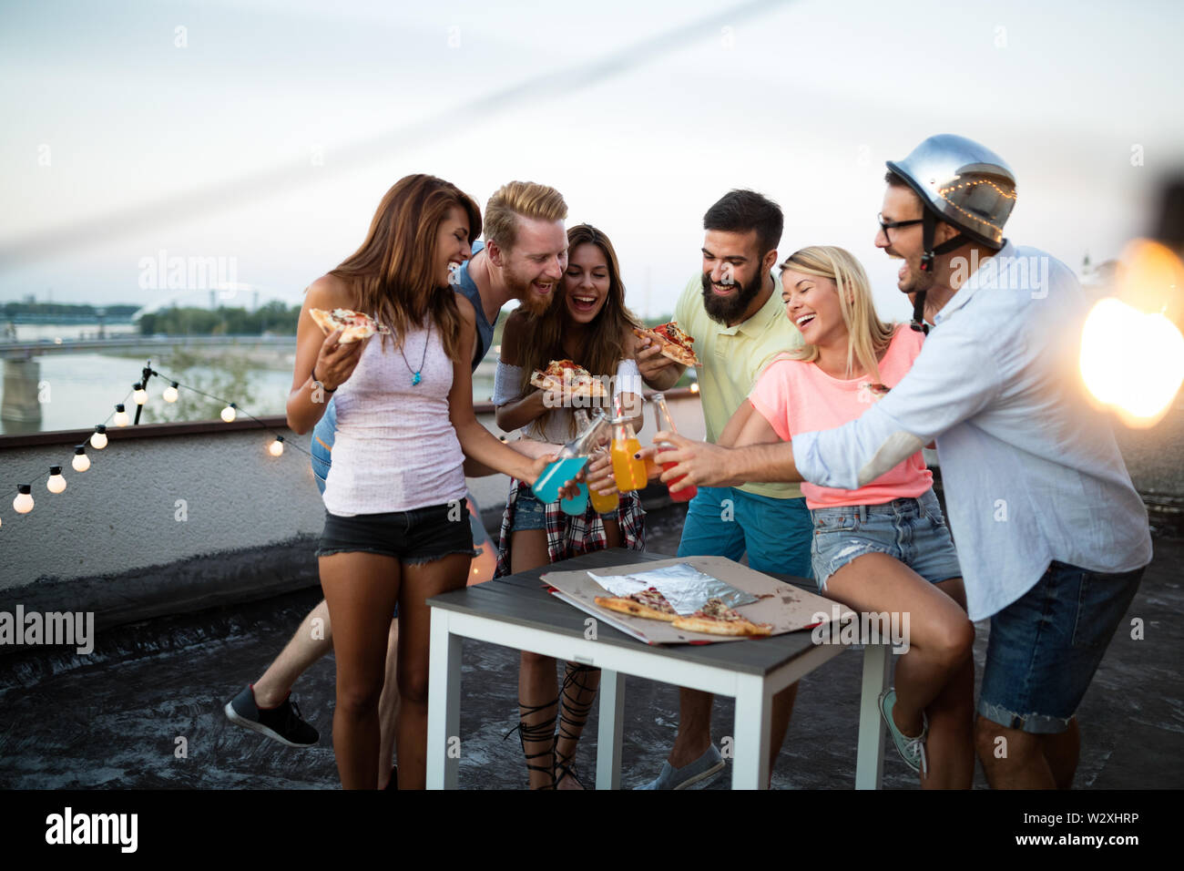 Happy group of young friends having fun in summer Stock Photo - Alamy