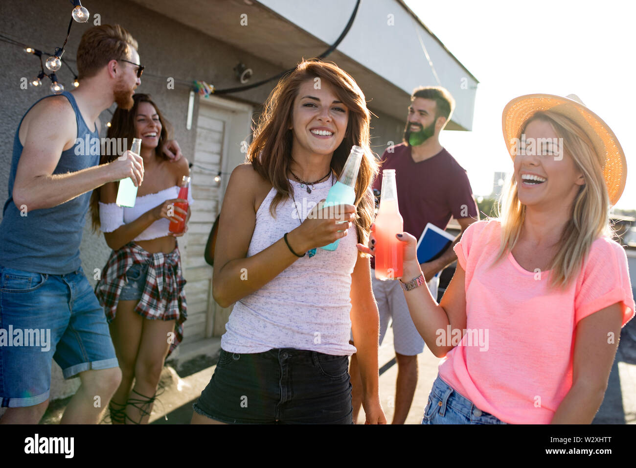 Group people roof party hi-res stock photography and images - Alamy