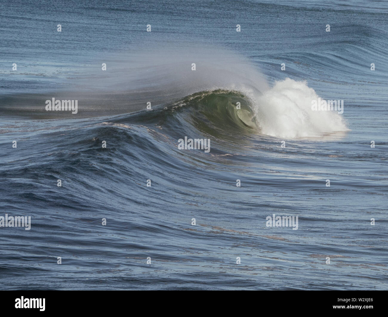 Waves with lots of sea spray Stock Photo - Alamy