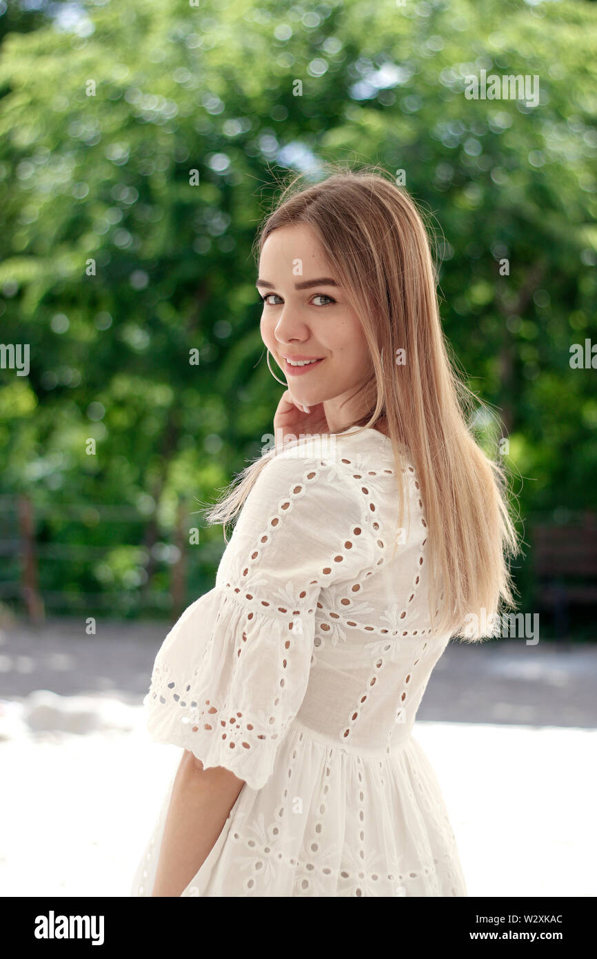 Nice girl sitting on chair hi-res stock photography and images - Alamy