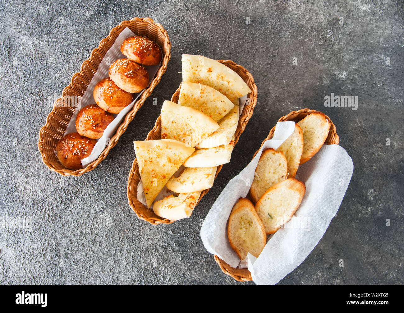 Variety bread snacks in a basket. Top view Stock Photo - Alamy