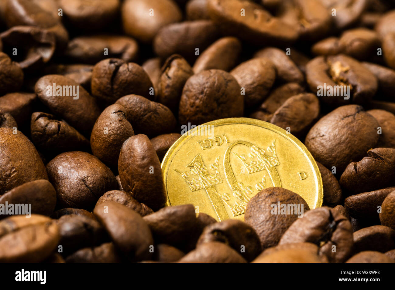 Sweden coffee market. Roasted coffee beans and 10 Swedish Kronor coin ...