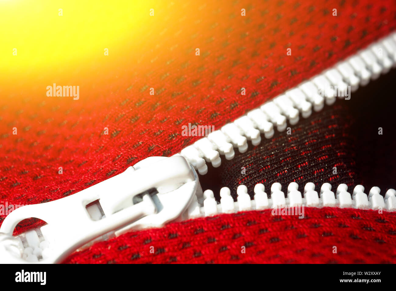 red sportswear closeup top view. white zip line. breathable knitwear ...