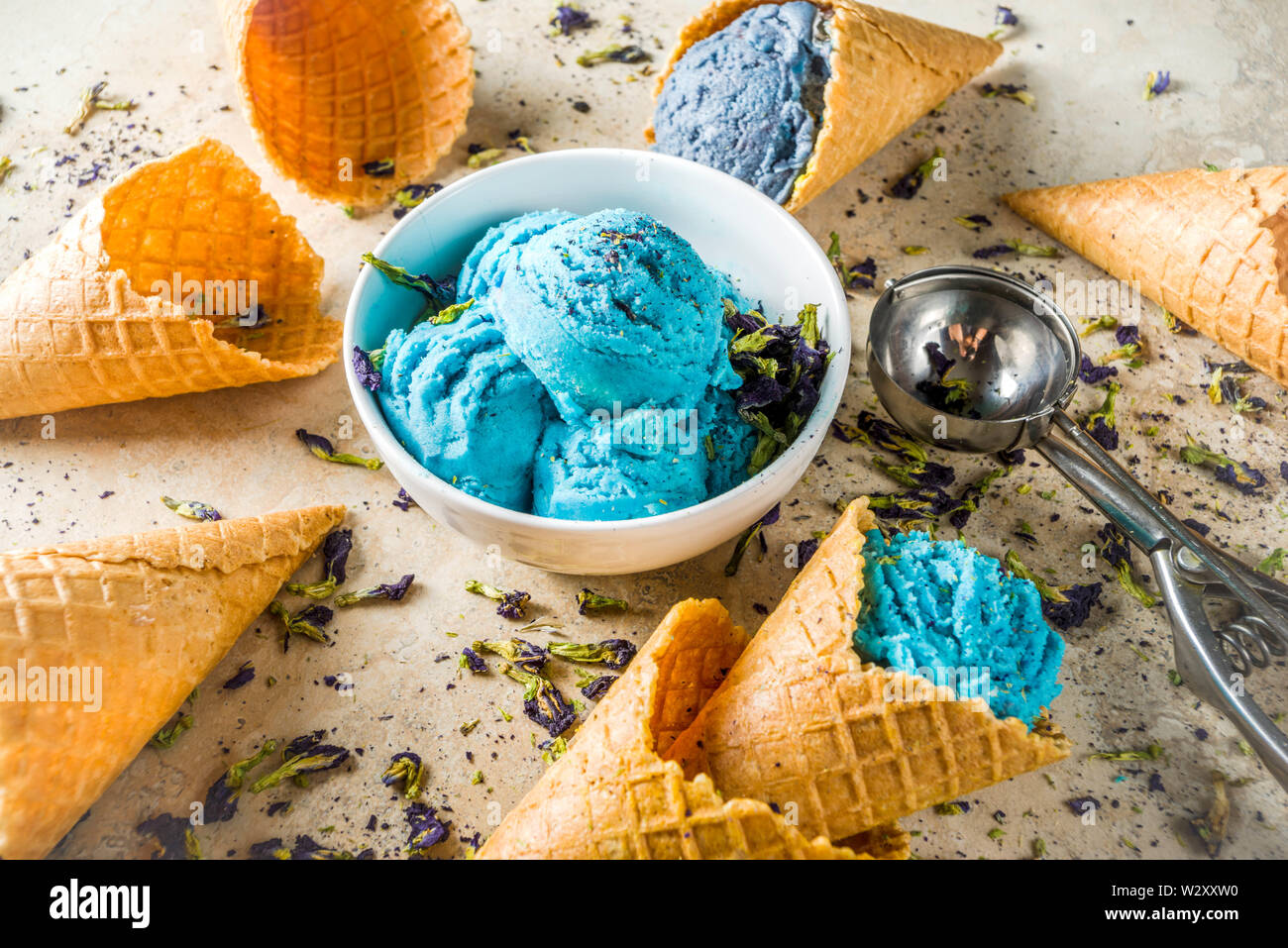 Trendy Color Changing Ice Cream with blue flowers powder, Butterfly Pea ...