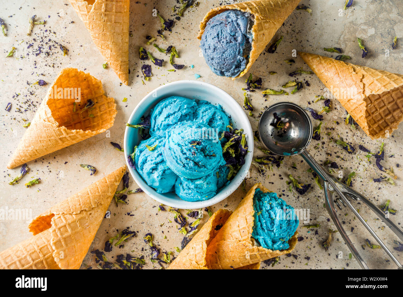Trendy Color Changing Ice Cream with blue flowers powder, Butterfly Pea ...