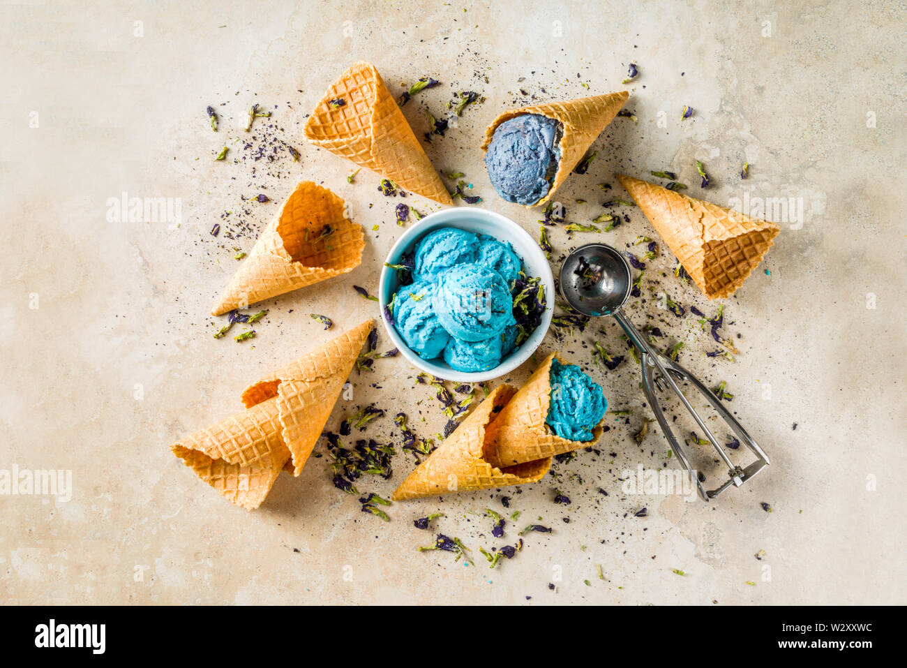 Trendy Color Changing Ice Cream with blue flowers powder, Butterfly Pea ...