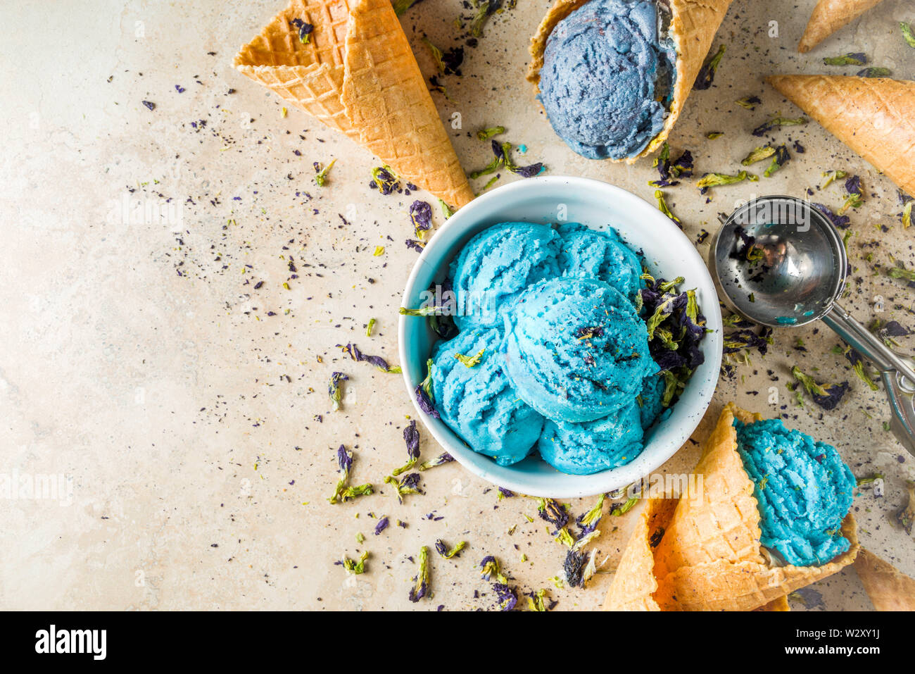Trendy Color Changing Ice Cream with blue flowers powder, Butterfly Pea ...