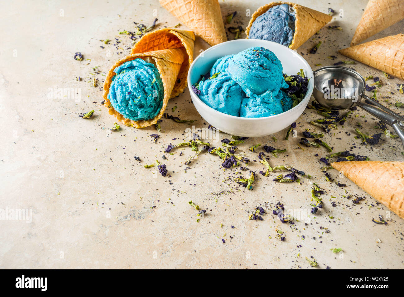 Trendy Color Changing Ice Cream with blue flowers powder, Butterfly Pea ...