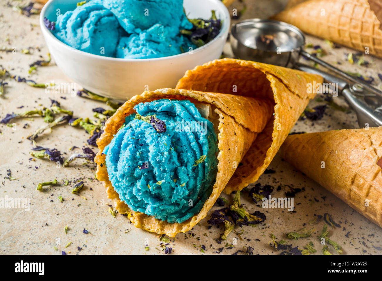 Trendy Color Changing Ice Cream with blue flowers powder, Butterfly Pea ...