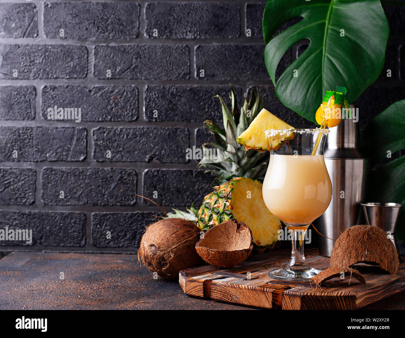 Pina colada cocktail with coconut and pineapple Stock Photo - Alamy