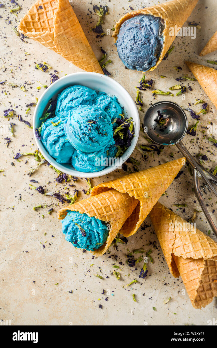 Trendy Color Changing Ice Cream with blue flowers powder, Butterfly Pea ...