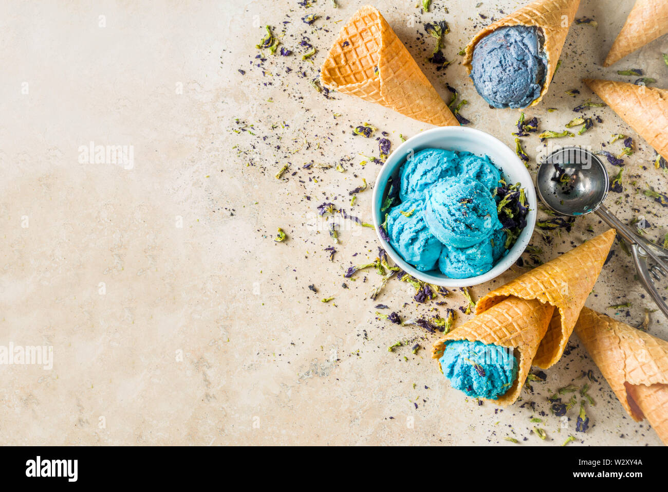 Trendy Color Changing Ice Cream with blue flowers powder, Butterfly Pea ...
