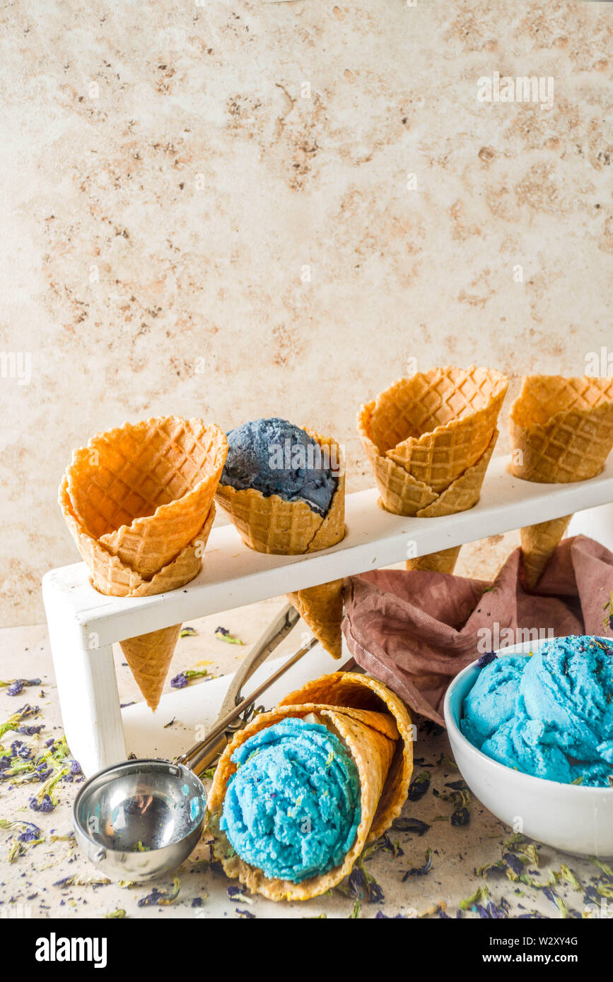 Trendy Color Changing Ice Cream with blue flowers powder, Butterfly Pea ...