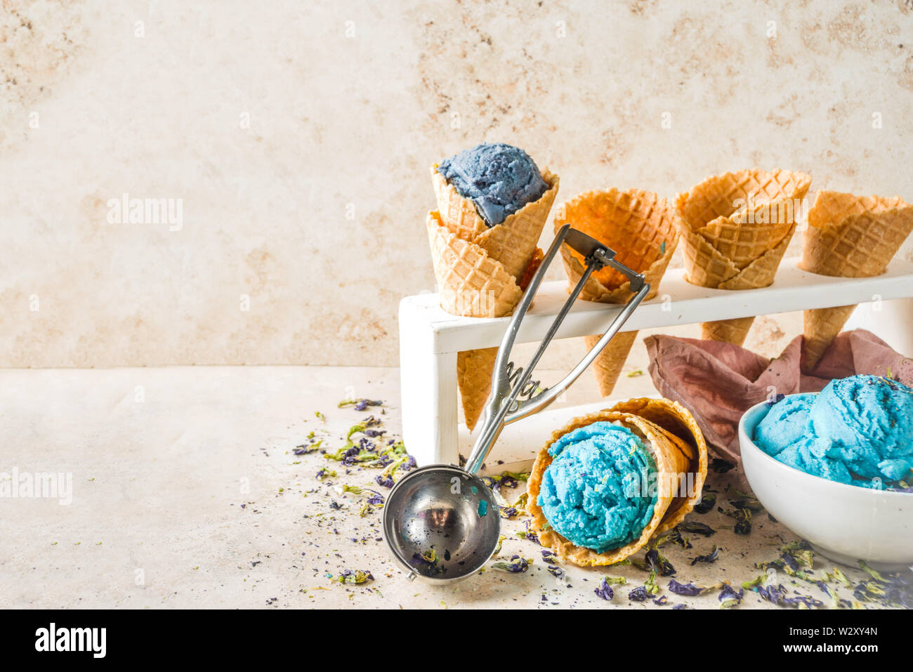 Trendy Color Changing Ice Cream with blue flowers powder, Butterfly Pea ...