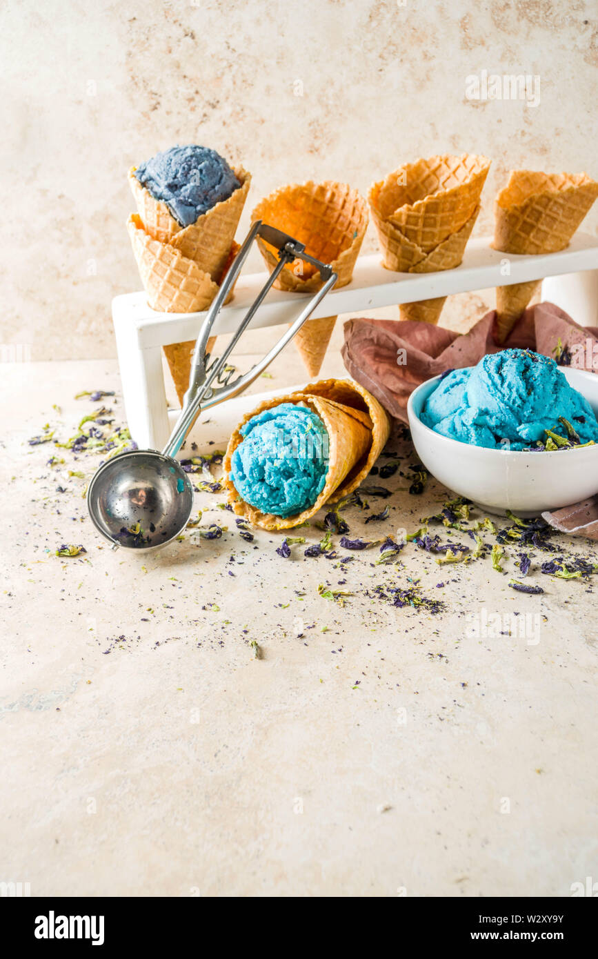 Trendy Color Changing Ice Cream with blue flowers powder, Butterfly Pea ...