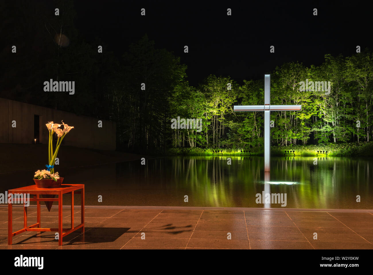 Cross on the water with an inverted reflection in a beautiful nature ...