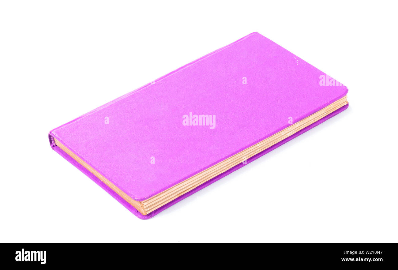 Closed old purple book isolated on white background Stock Photo - Alamy