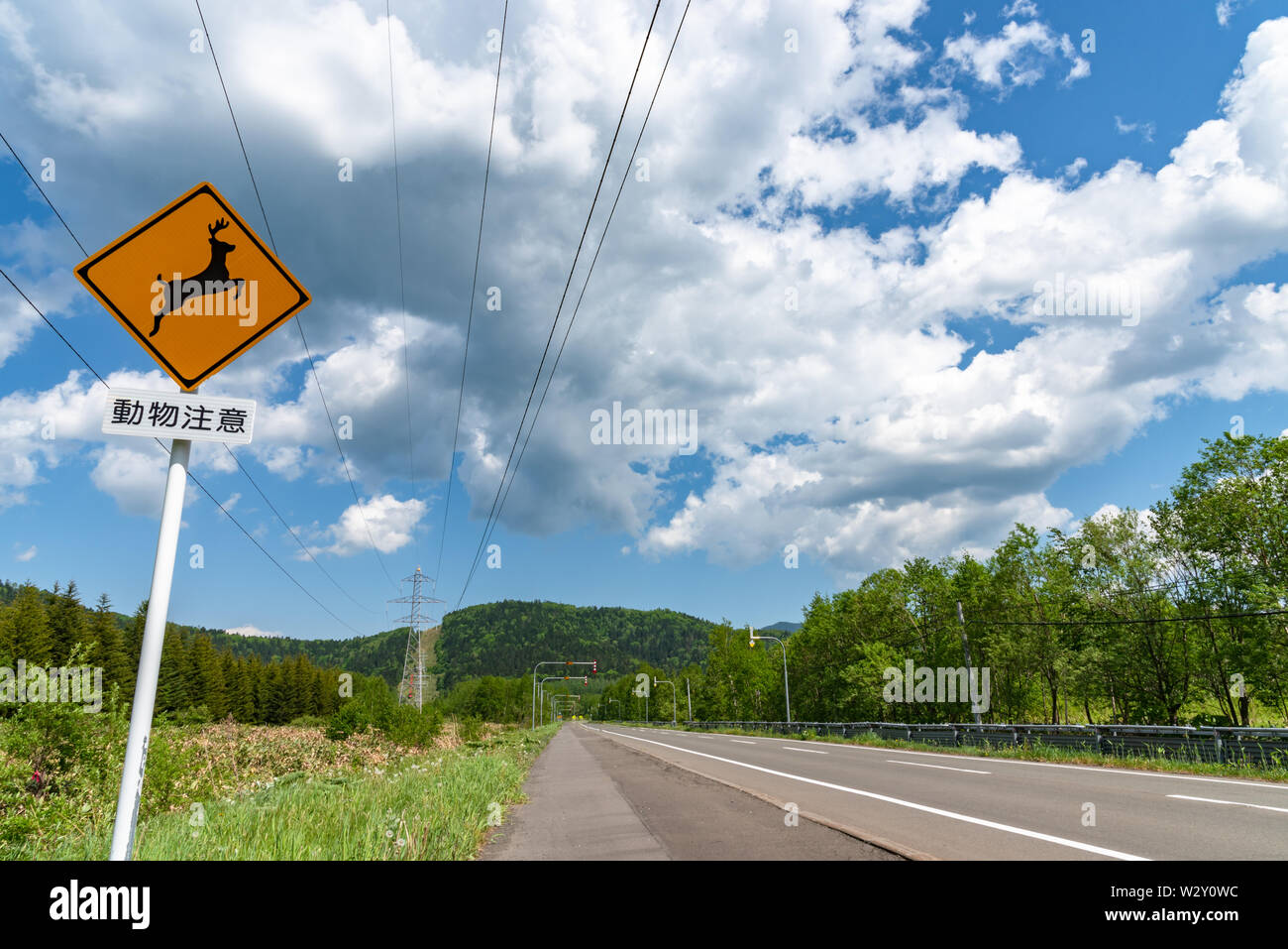 Warning sign on electricity pole hi-res stock photography and images ...