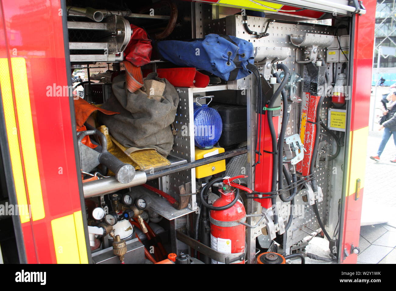 Modern firefighter truck with an emergency tool and equipment for using ...