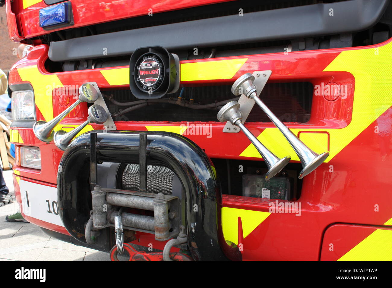 Modern firefighter truck with an emergency tool and equipment for using ...
